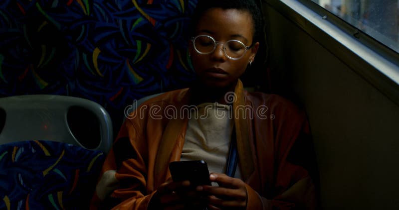 Young Female Commuter Using Mobile Phone while Travelling in Bus 4k ...