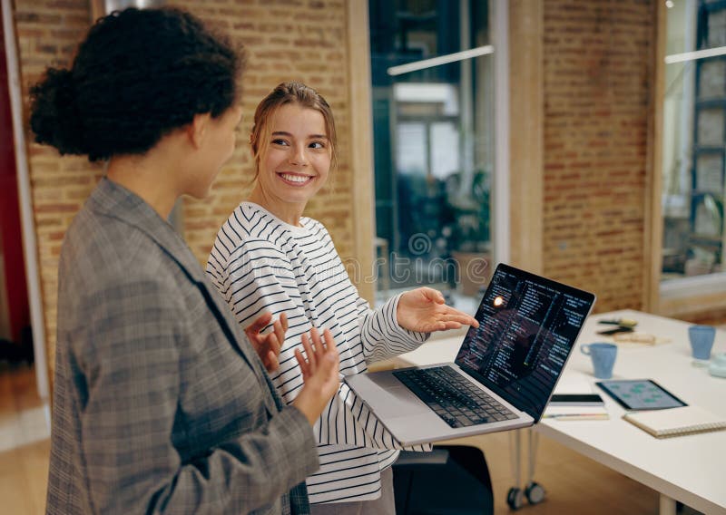 Young Female Runner is Having Break and Listening To Music in Headphones during the Run in City ...