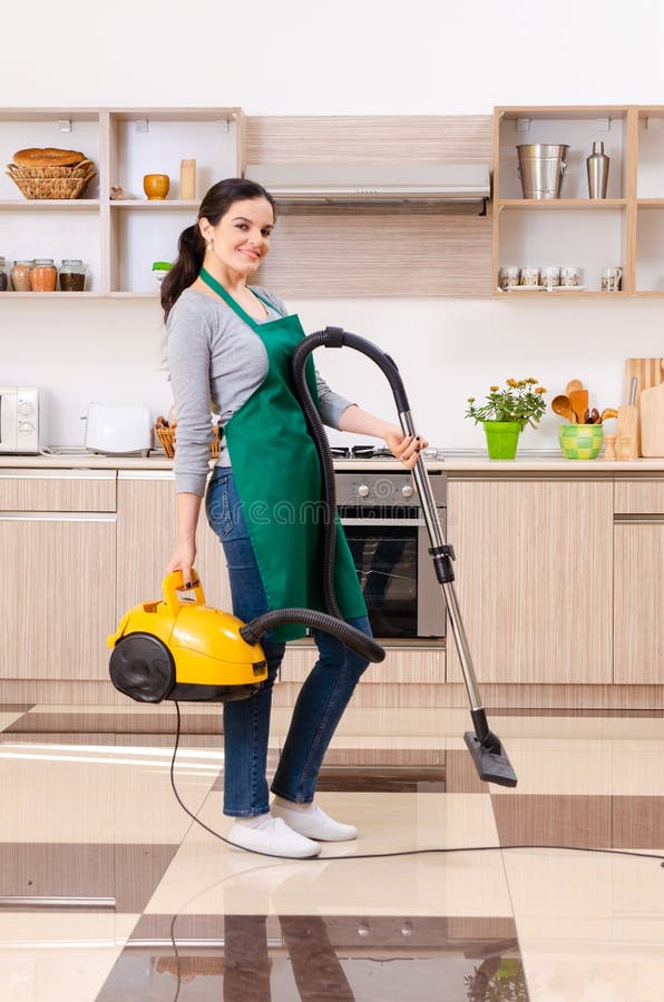 Young Female Contractor Doing Housework Stock Image - Image of dust ...