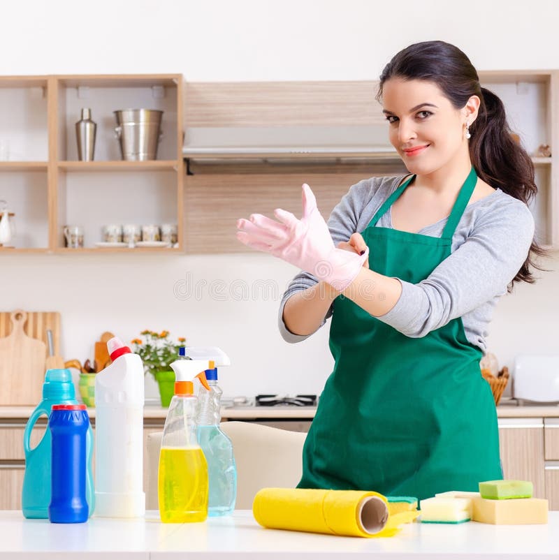 Young Female Contractor Doing Housework Stock Photo - Image of cheerful ...