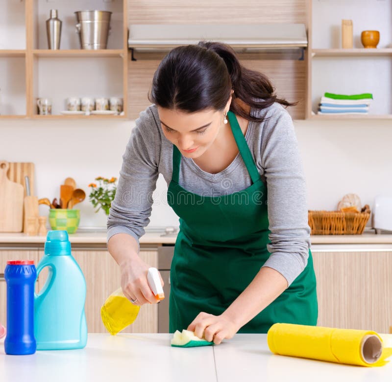 Young Female Contractor Doing Housework Stock Image - Image of ...