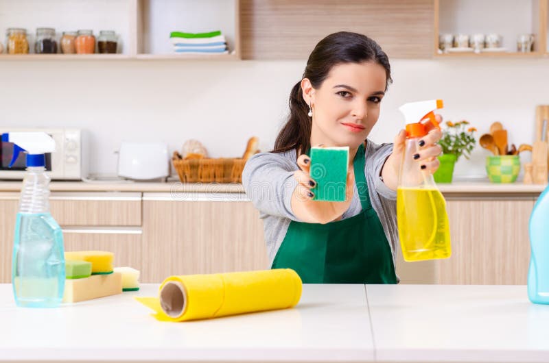 Young Female Contractor Doing Housework Stock Photo - Image of kitchen ...