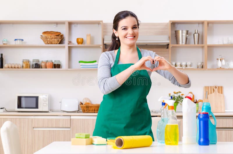 Young Female Contractor Doing Housework Stock Image - Image of ...