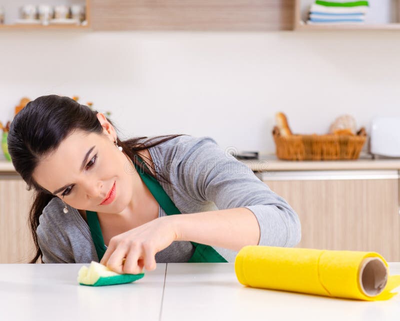 Young Female Contractor Doing Housework Stock Image - Image of ...