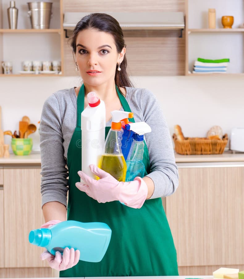 Young Female Contractor Doing Housework Stock Photo - Image of cleaning ...