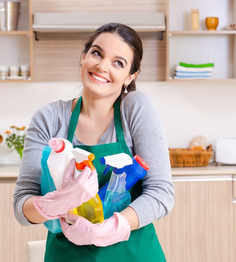 Young Female Contractor Doing Housework Stock Image - Image of clean ...
