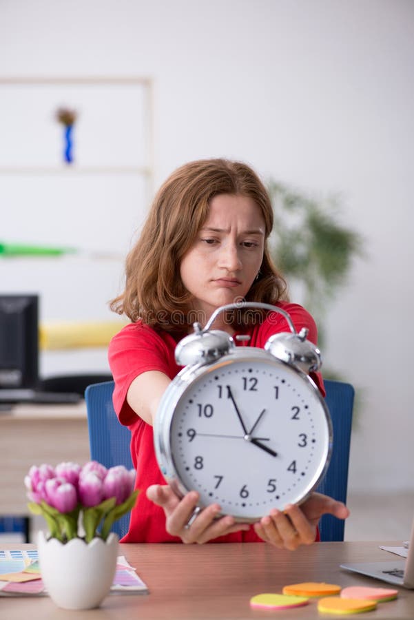 Young Female Designer in Time Management Concept Stock Image - Image of ...