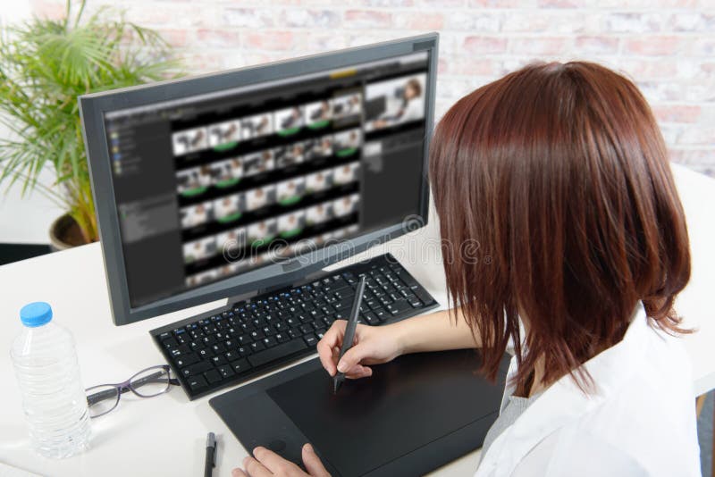 Young Female Designer Using Computer for Video Editing Stock Image ...