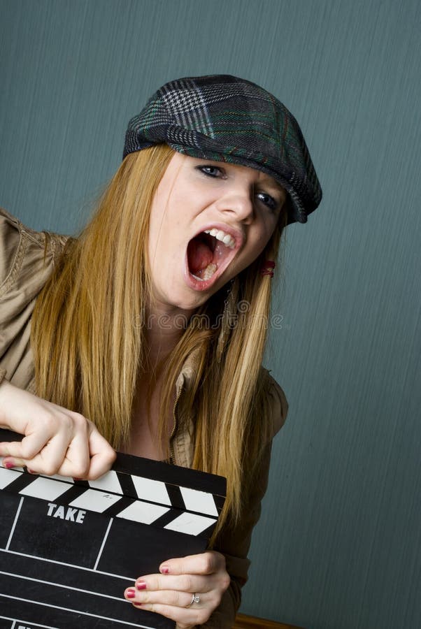 Young Female Director with Slate Yelling Stock Photo - Image of ...