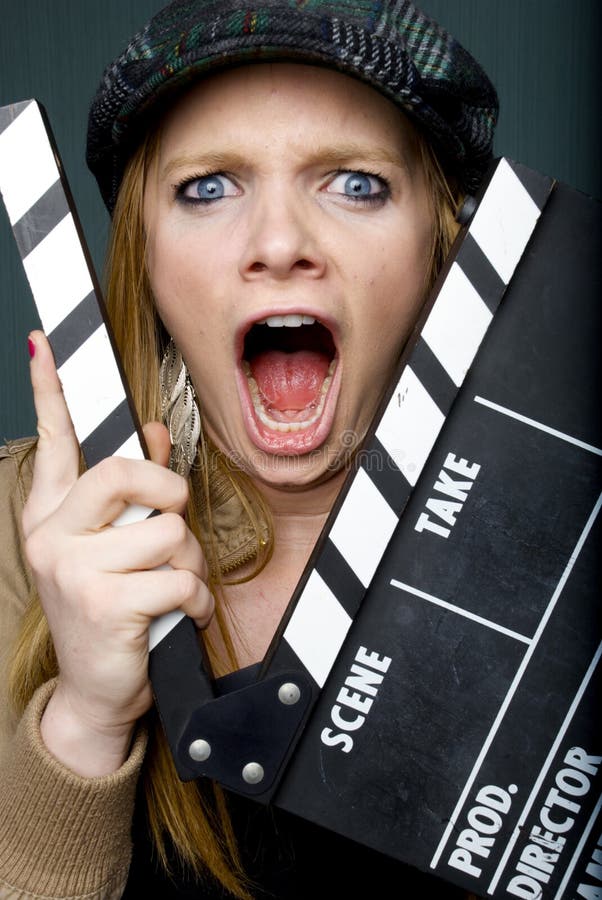 Young Female Director with Slate Yelling Stock Photo - Image of ...