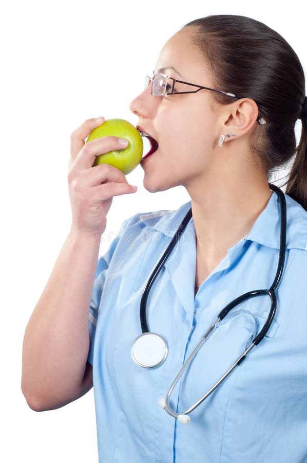Young Female Doctor Eating Apple Stock Image - Image of beautiful ...