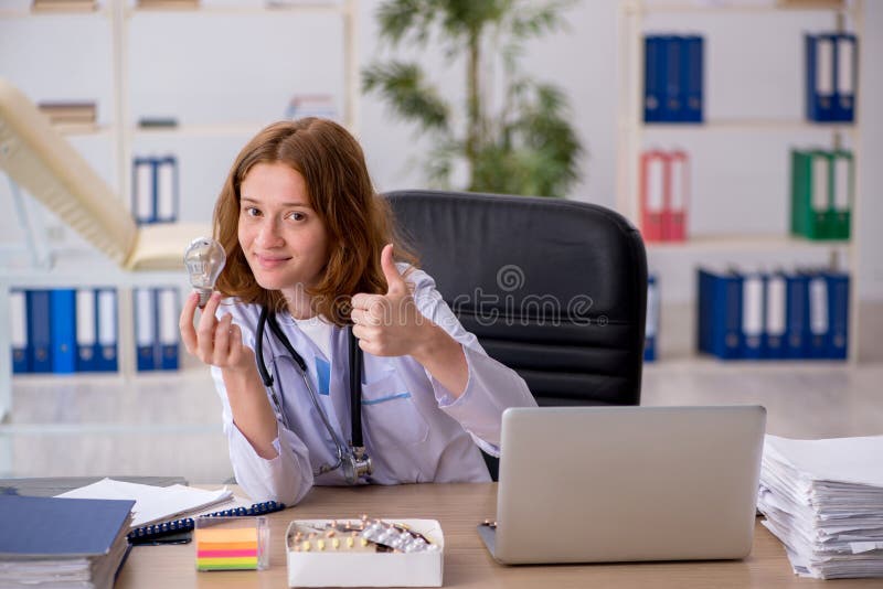 Young Female Doctor in Happy Idea Concept Stock Photo - Image of ...