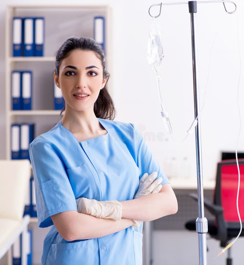 Young Female Doctor in Infusion Concept Stock Image - Image of catheter ...
