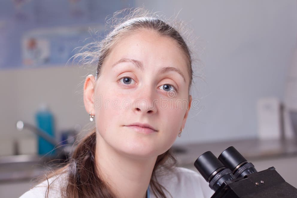 Young Female Doctor with Microscope Stock Photo - Image of look ...