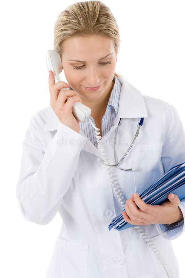 Doctor calling on phone stock image. Image of computer - 8377815