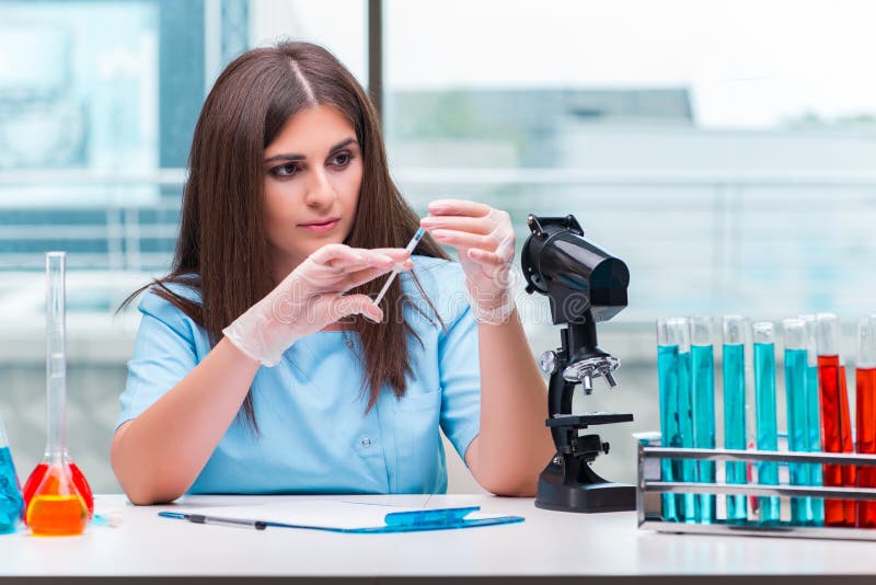 The Young Female Doctor Working in the Lab Stock Image - Image of ...