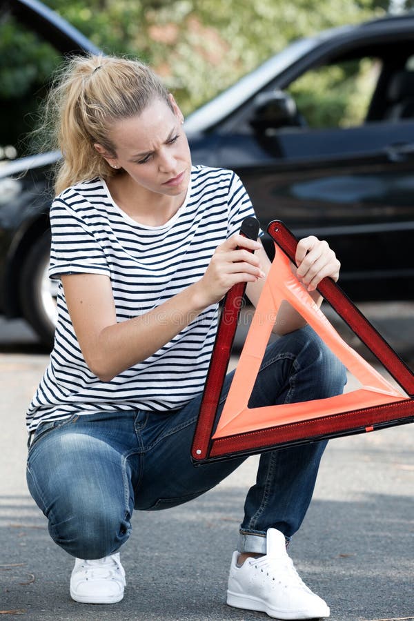 Young Female Driver Making Safety Triangle Stock Photo - Image of woman ...