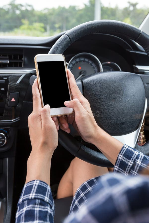 Young Female Driver Using Touch Screen Smartphon Stock Photo - Image of ...