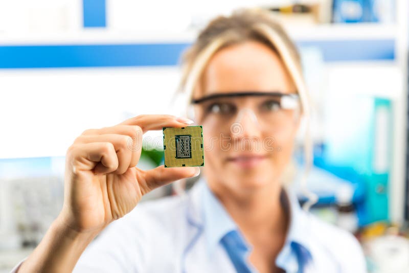 Young Female Electronic Engineer Holding CPU in Hand Stock Image ...