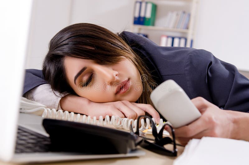The Young Female Employee Sleeping in the Office Stock Image - Image of ...