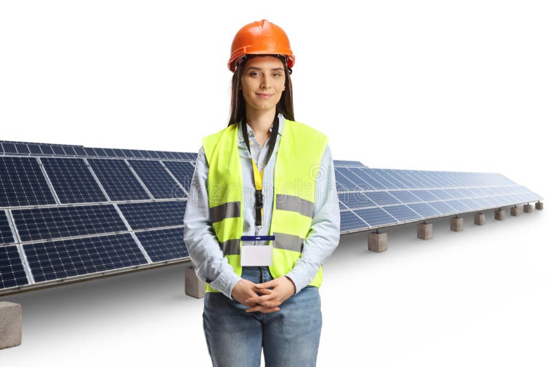 Young Female Engineer with a Safety Vest and Hardhat Standing in Front ...