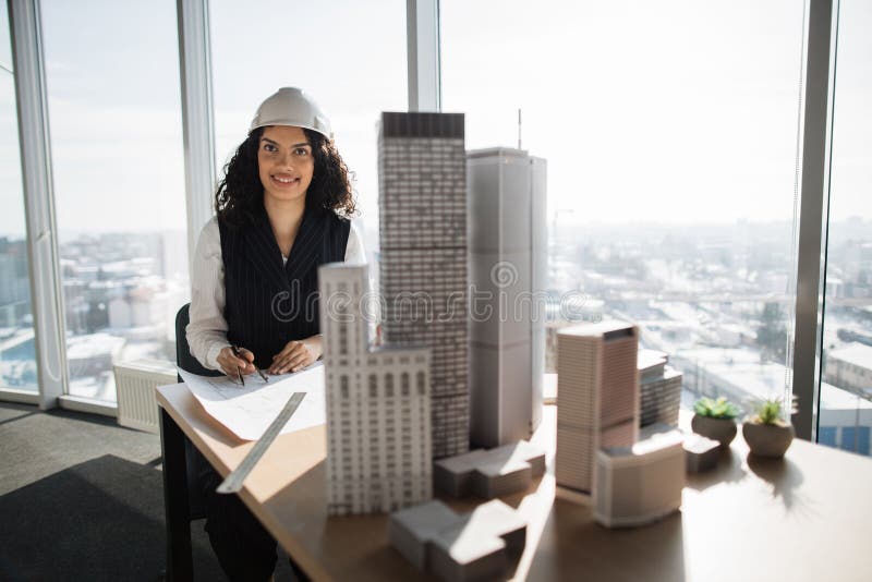 Young Female Engineer in White Helmet Working on Building Complex ...