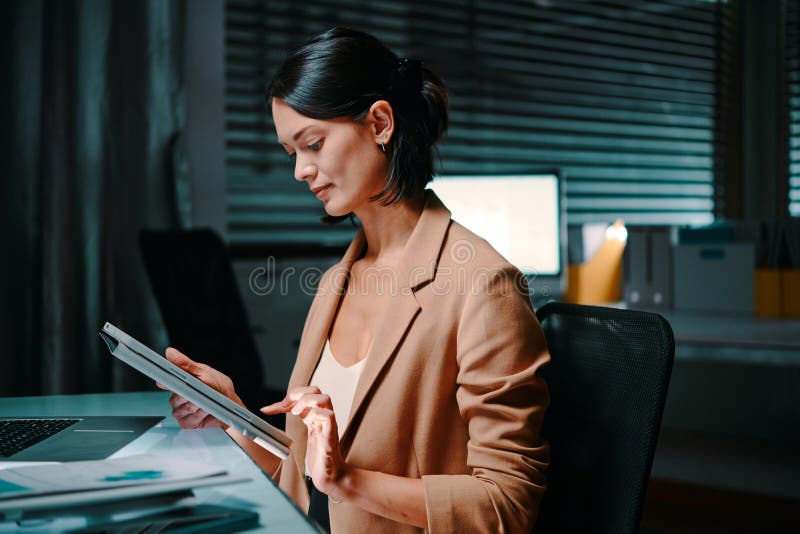 Female Entrepreneur Reading Report Stock Image - Image of sitting ...