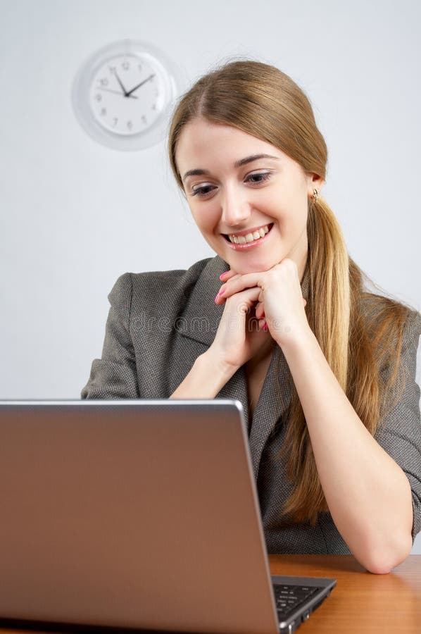 Young Female Executive Working on Laptop Stock Photo - Image of smile ...