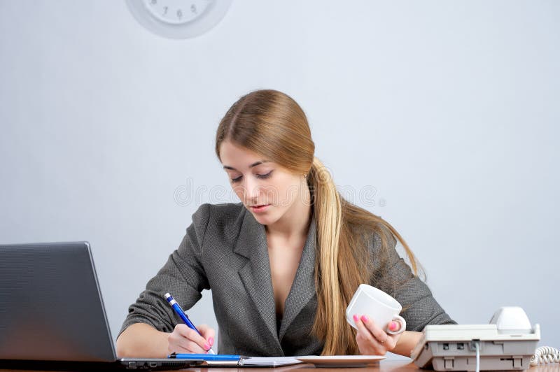 Young Female Executive Writing Stock Photo - Image of business, office ...