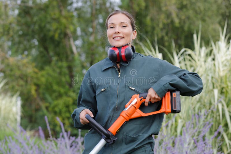 Young Female Gardener with Machine Stock Image - Image of holding ...
