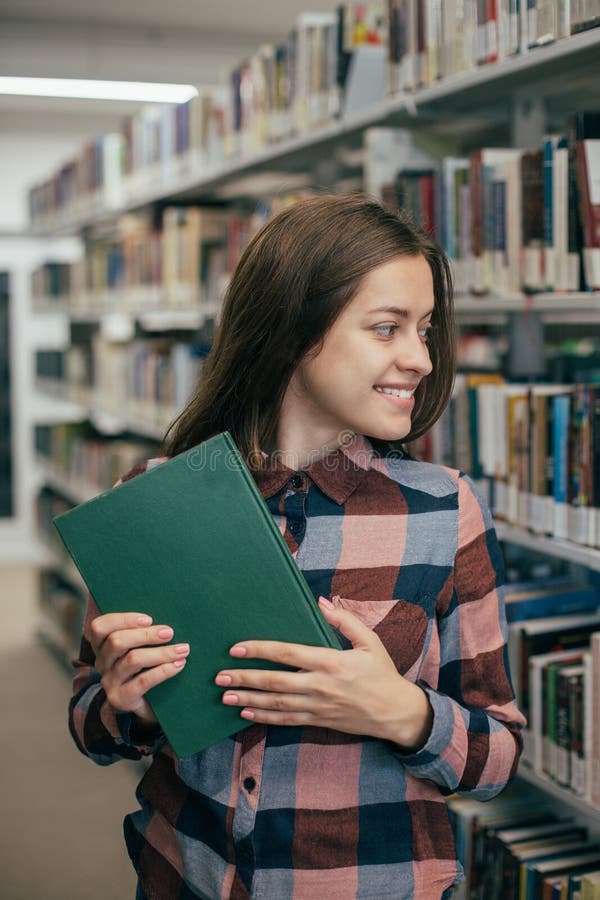 Smiling with a book stock image. Image of bright, faces - 193329