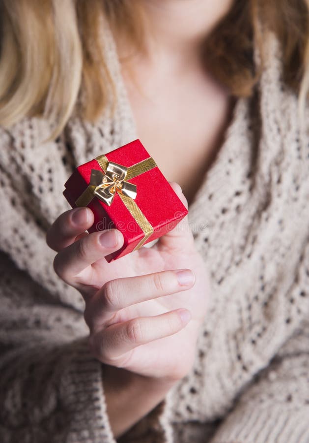 Young Female Hand Holding Single Red Gift Box Stock Photo - Image of ...