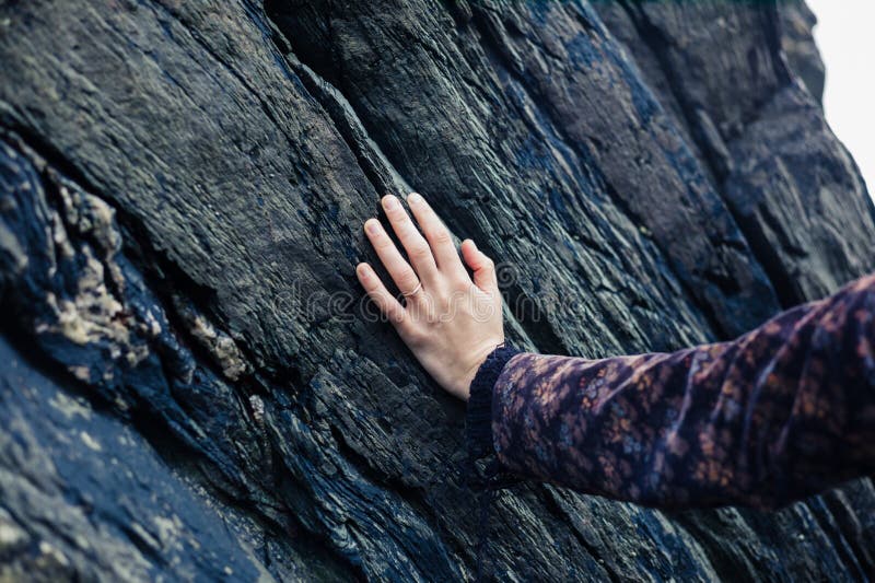 Young Female Hand Touching Rock Stock Photo - Image of ring, rocks ...