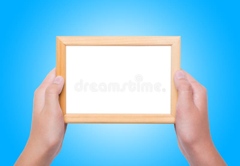 Young Female Hands Holding Photo Frame Over Blue Background Stock Photo ...