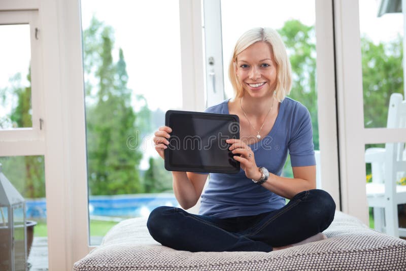 Young Female Holding Tablet Pc Stock Photo - Image of house, holding ...