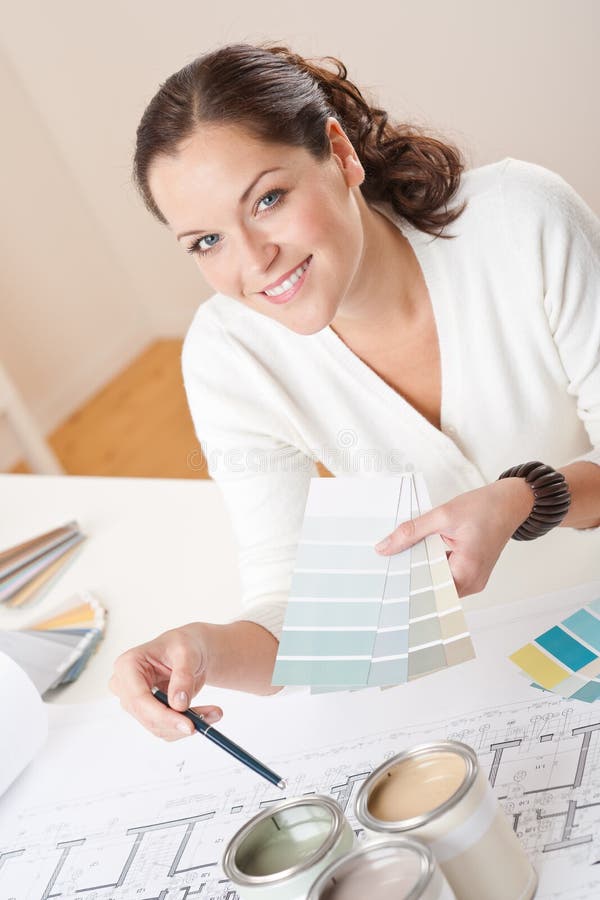 Young Female Interior Designer Working at Office Stock Image - Image of ...