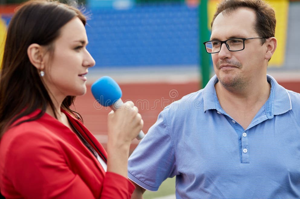 Young Female Journalist Interviews Man, Focus on Stock Image - Image of ...