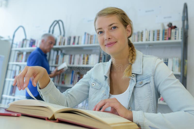 Young female in library stock photo. Image of asian - 164149884