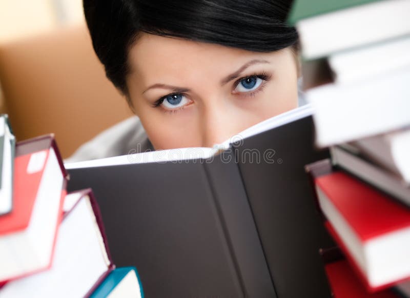 Young Female Looks Out Over the Book Stock Image - Image of learning ...