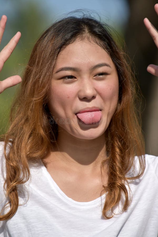Young Female Making Funny Faces Stock Photo - Image of joyful, feelings ...
