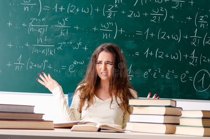 Young Female Math Teacher in Front of Chalkboard Stock Image - Image of ...