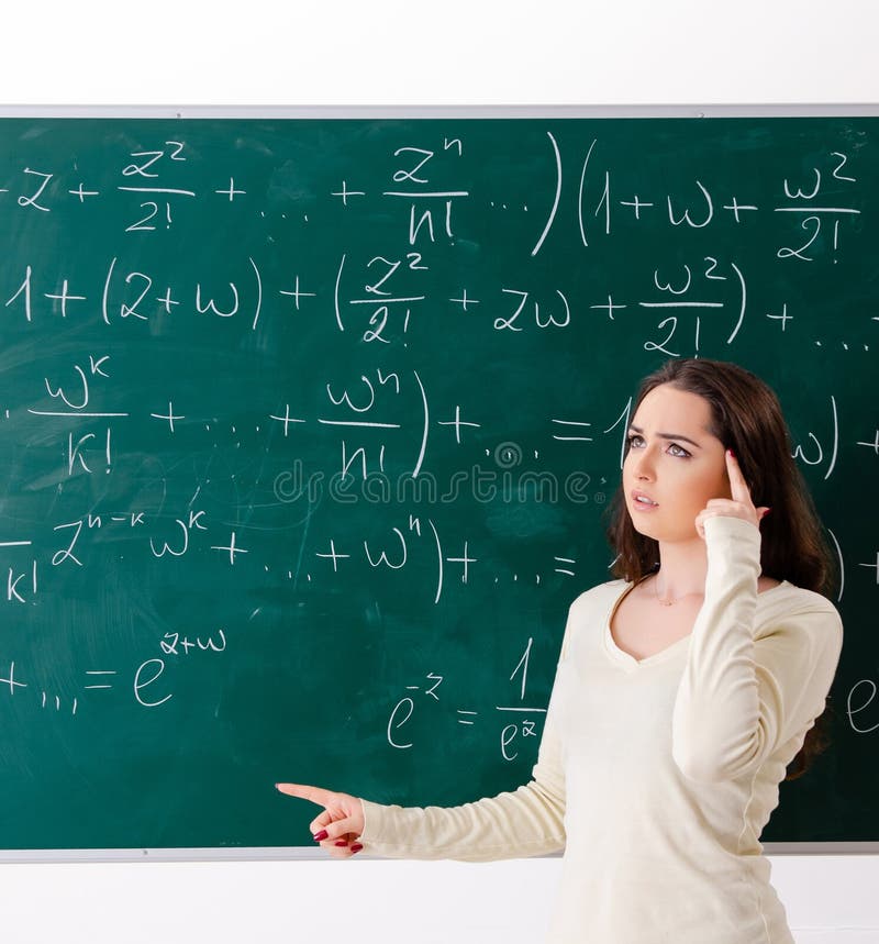 Young Female Math Teacher in Front of Chalkboard Stock Image - Image of ...
