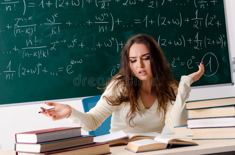 Young Female Math Teacher in Front of Chalkboard Stock Photo - Image of ... Young Female Math Teacher in Front of Chalkboard Stock Photo - Image of ...