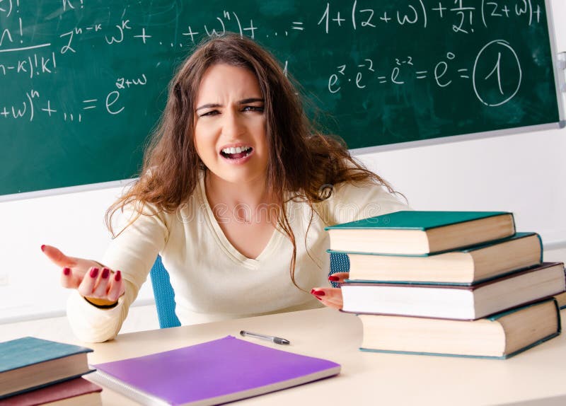 Young Female Math Teacher in Front of Chalkboard Stock Image - Image of ...