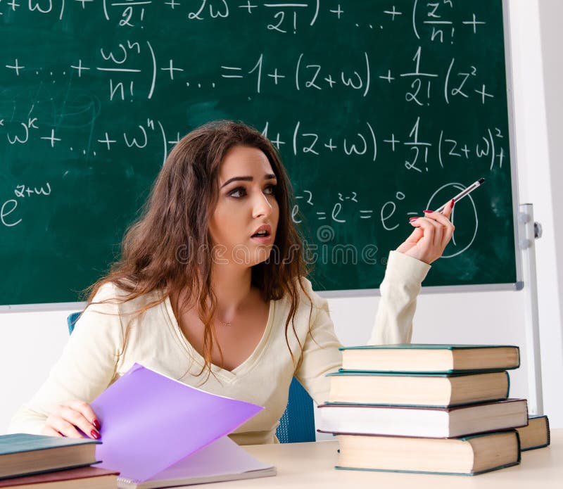 Young Female Math Teacher in Front of Chalkboard Stock Image - Image of ...