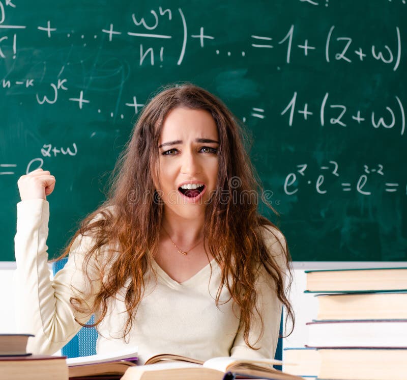 Young Female Math Teacher in Front of Chalkboard Stock Image - Image of ...