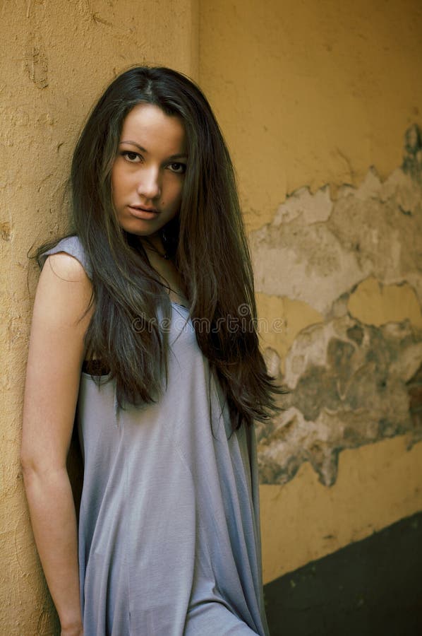 Young Female Model Standing Near the Old Wall Stock Photo - Image of ...