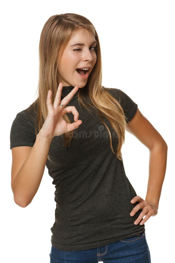 Young Winking Female Gesturing OK Stock Image - Image of casual ...