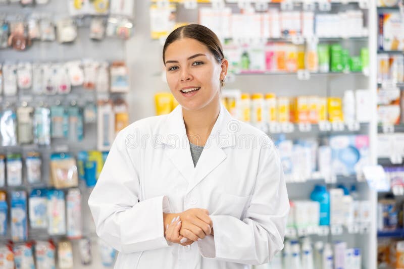 Young Female Pharmacist in Uniform Posing in Pharmacy Stock Image ...