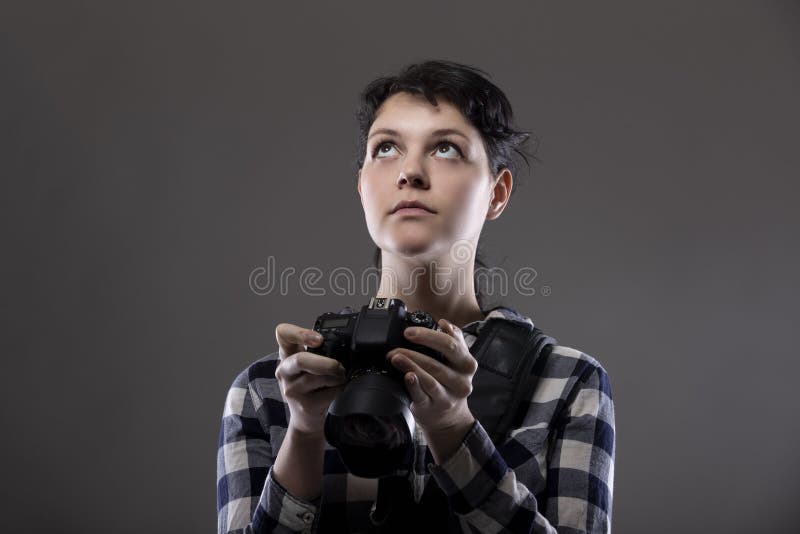 Freelance Photographer Posing in a Studio with a Camera Stock Image ...